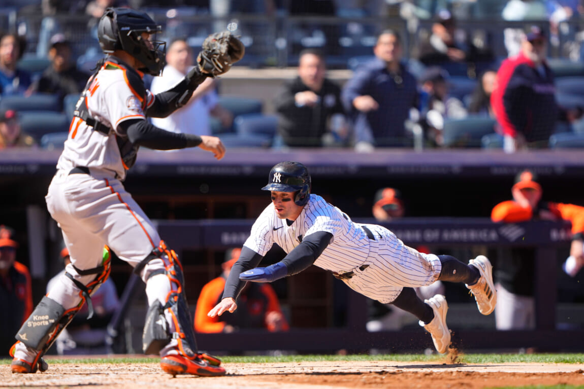 Yankees sign two pitchers to Major League roster, speedy outfielder ...